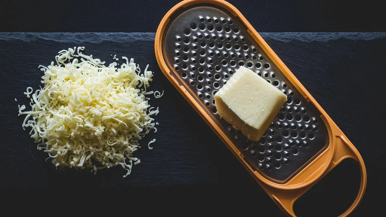 Why buying pre-shredded cheese is a waste of money (and it's not just ...