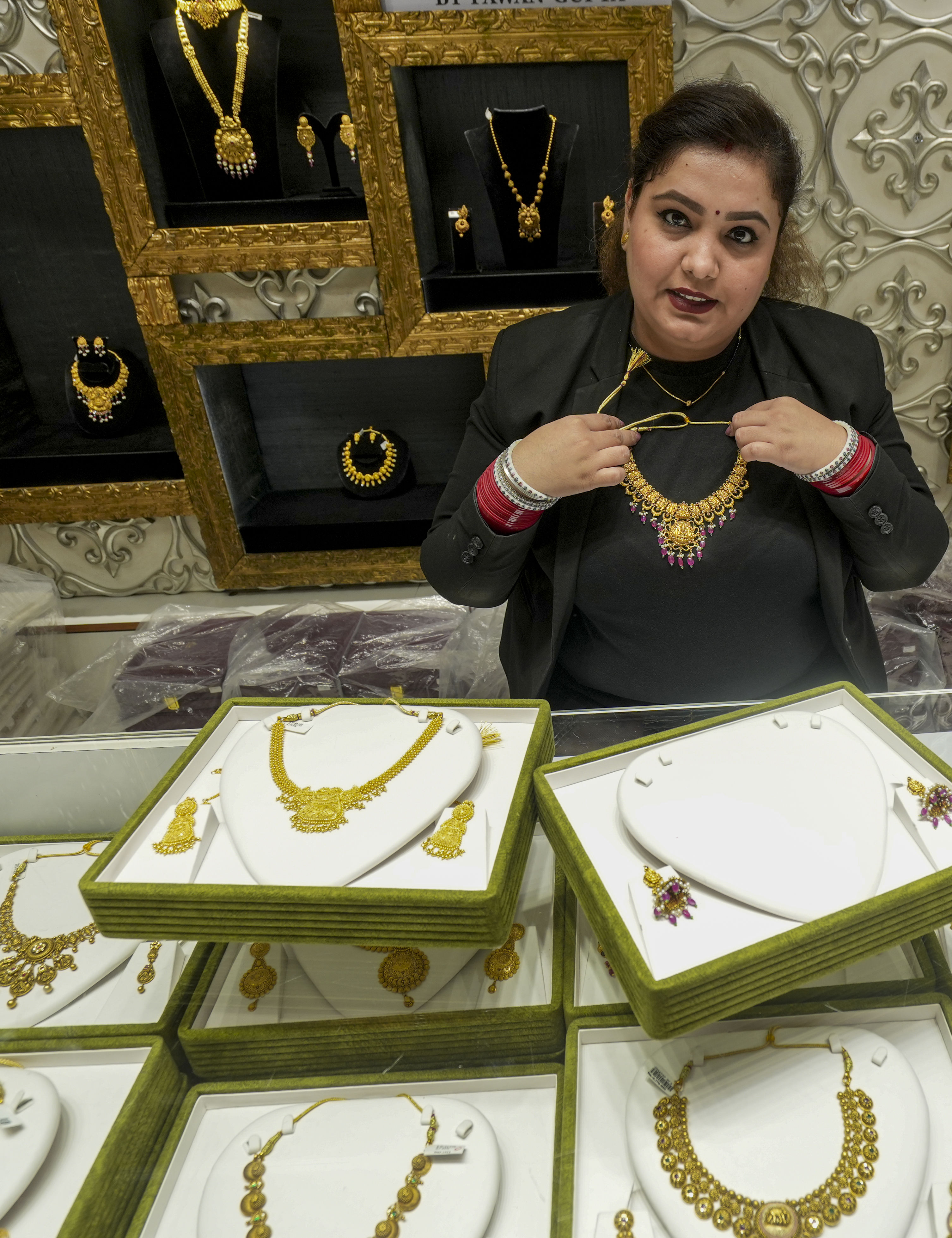 Gold drops Rs 1,100, silver extends slide as oil surge stokes inflation ...