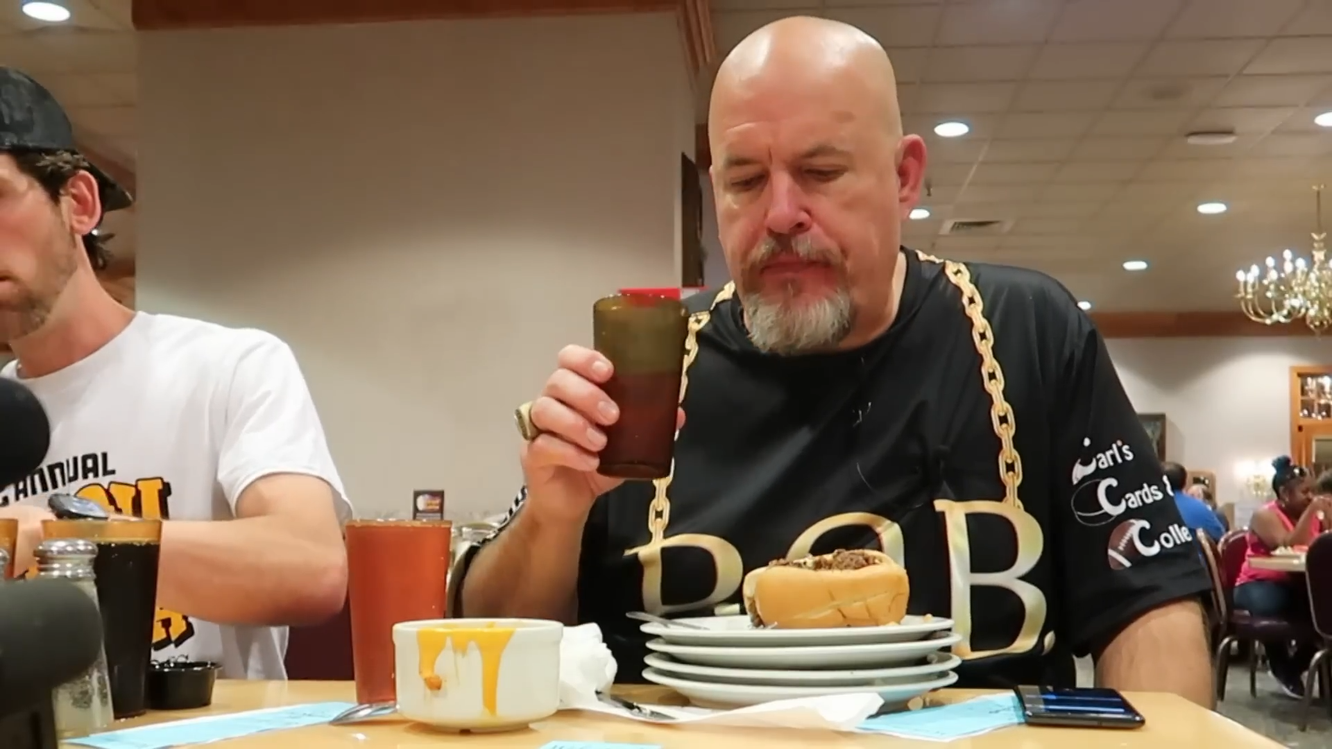 Buffet diners react as one customer piles up an enormous plate