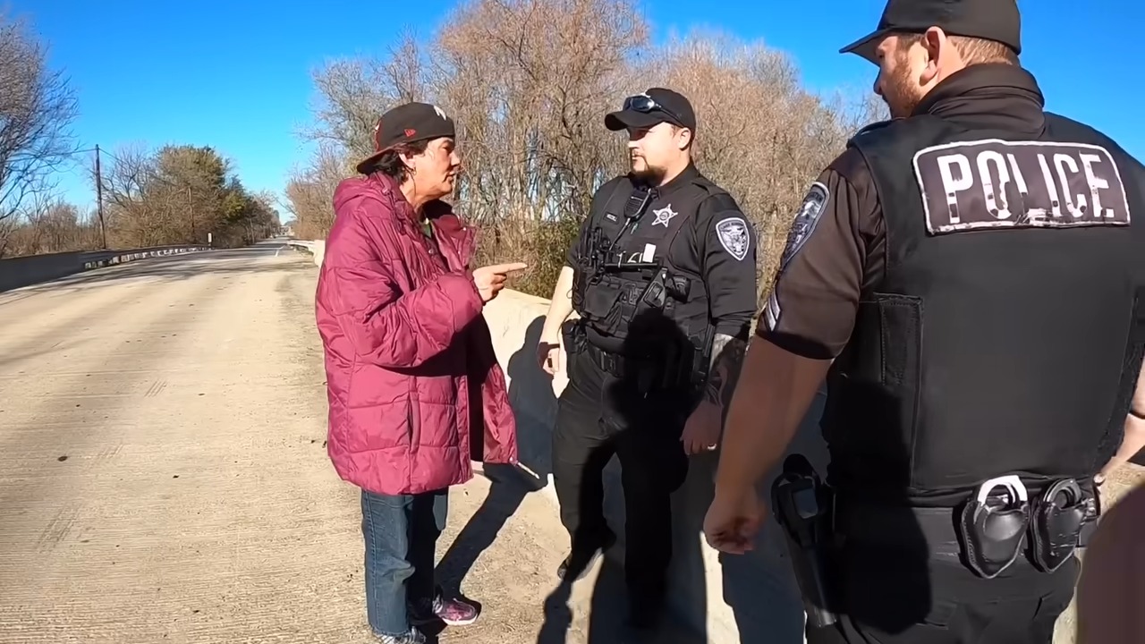 Why this woman thought she could touch a cop - then got handcuffed in ...