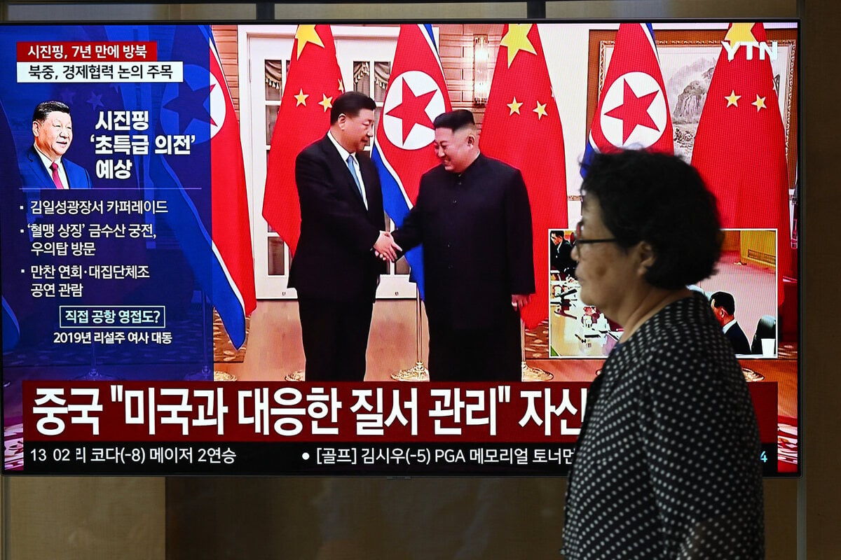 China's Xi hails "invincible friendship" after landing in North Korea ...