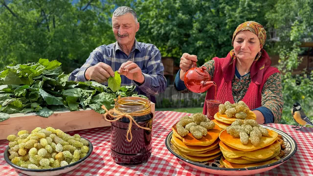 Harvesting mulberries the traditional village way