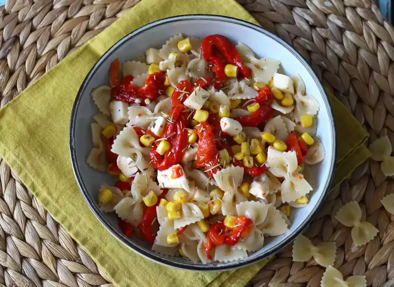 Cold pasta with peppers, corn and mozzarella cheese