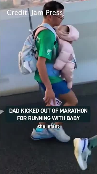 Dad kicked out of marathon for running with baby