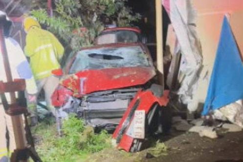 Three girls injured as stolen car smashes into home south of Brisbane