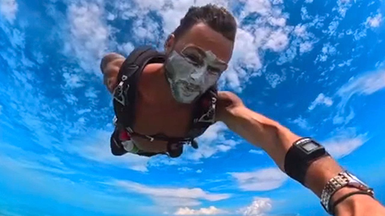Skydiver takes face full of whipped cream, looks cool as he falls anyway