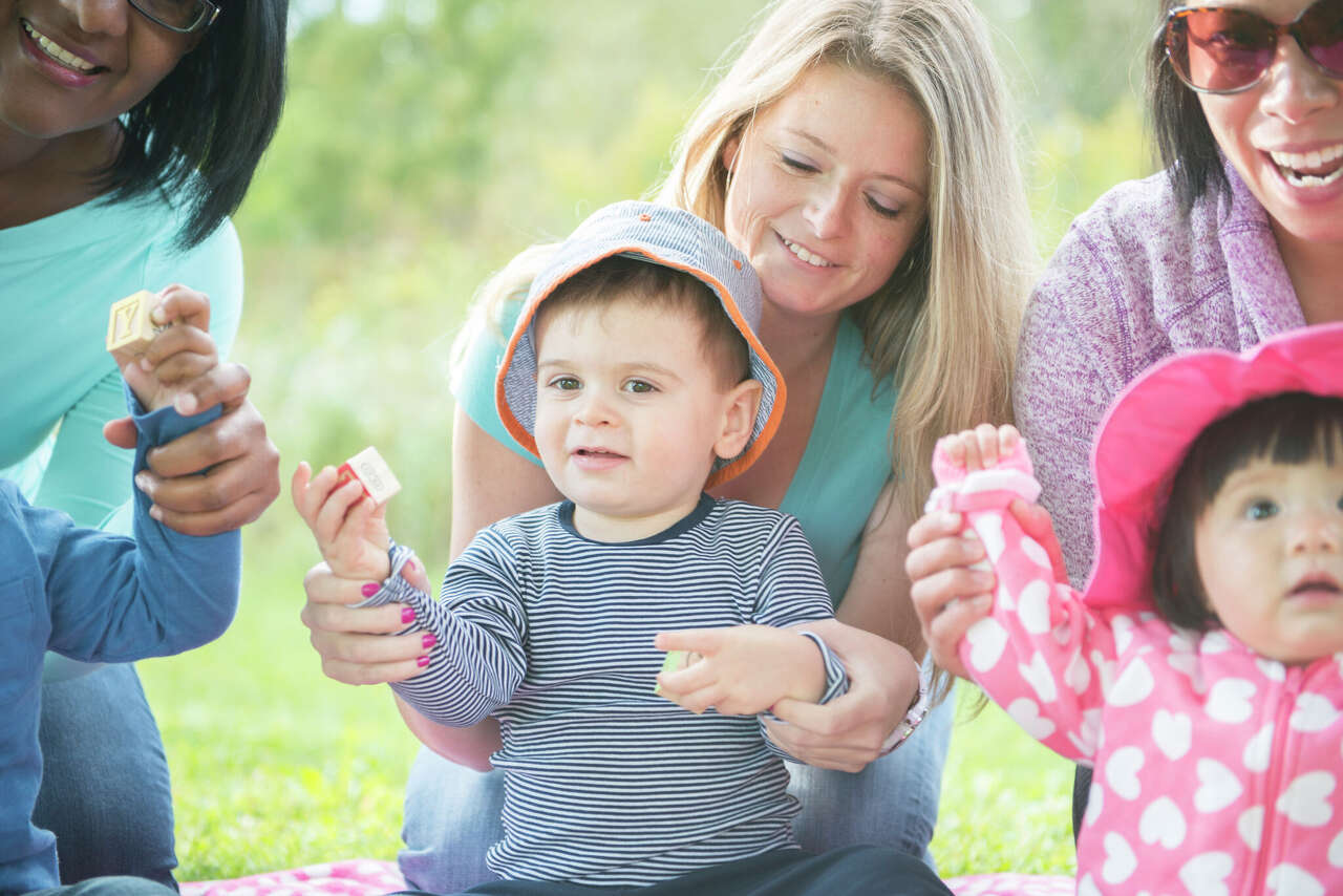 Weekly play dates at Community Park aim to bond families of young children
