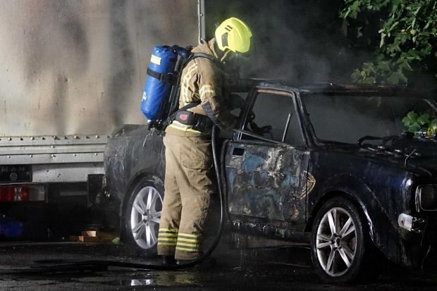 Emergency services tackle car fire