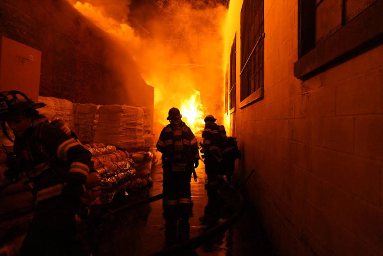 Rochester crews battle massive five alarm fire at Pallet Express