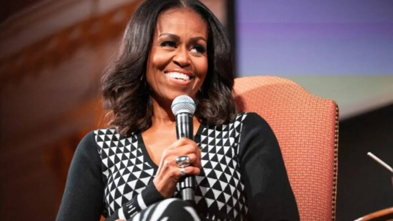 Quote of the day by Michelle Obama: “Success isn't about how much money ...