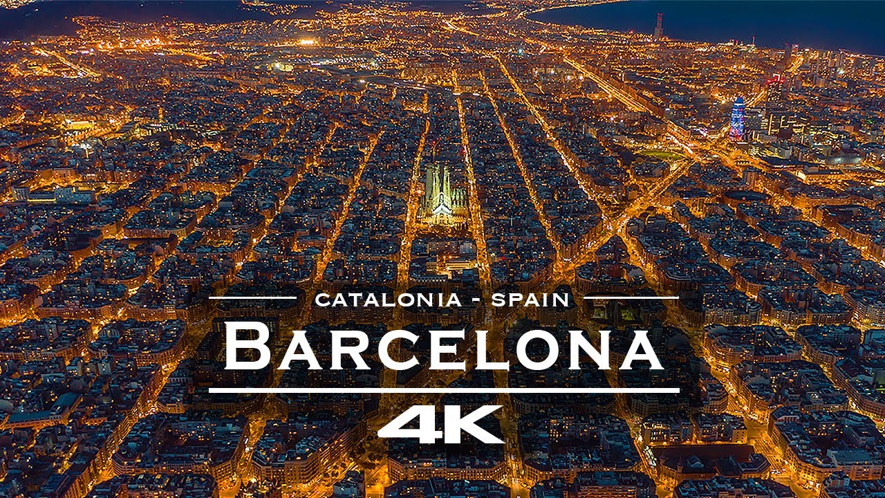 Barcelona at night from above in stunning drone views