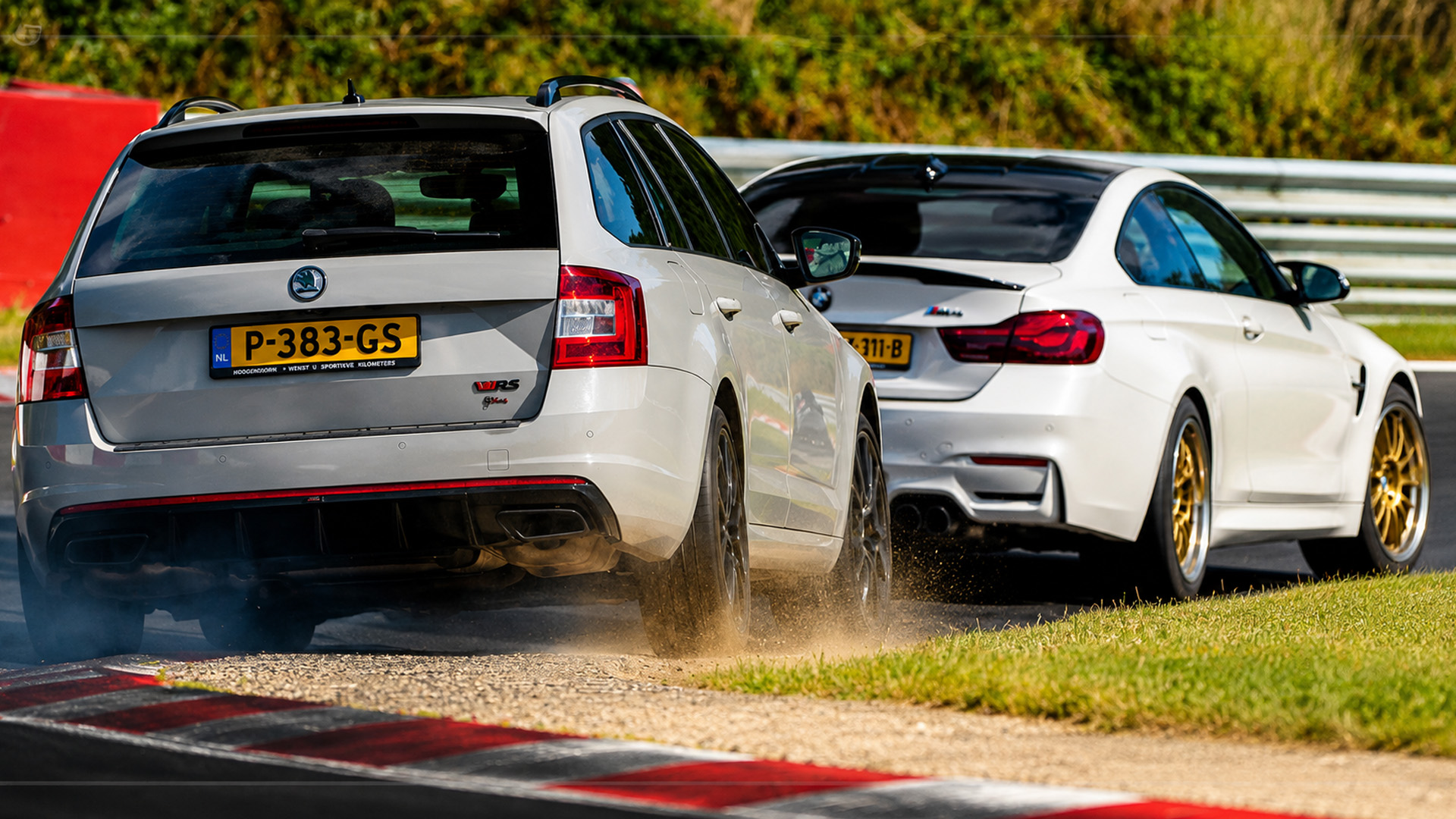 Skoda Octavia battles BMW through a tight track corner