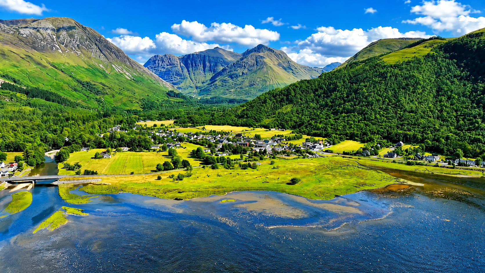 Glencoe opening toward Loch Leven beneath the rugged Highlands