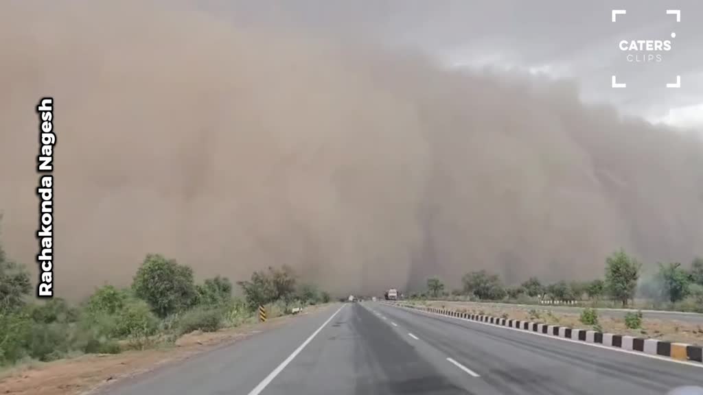 Driver heads straight into massive dust storm