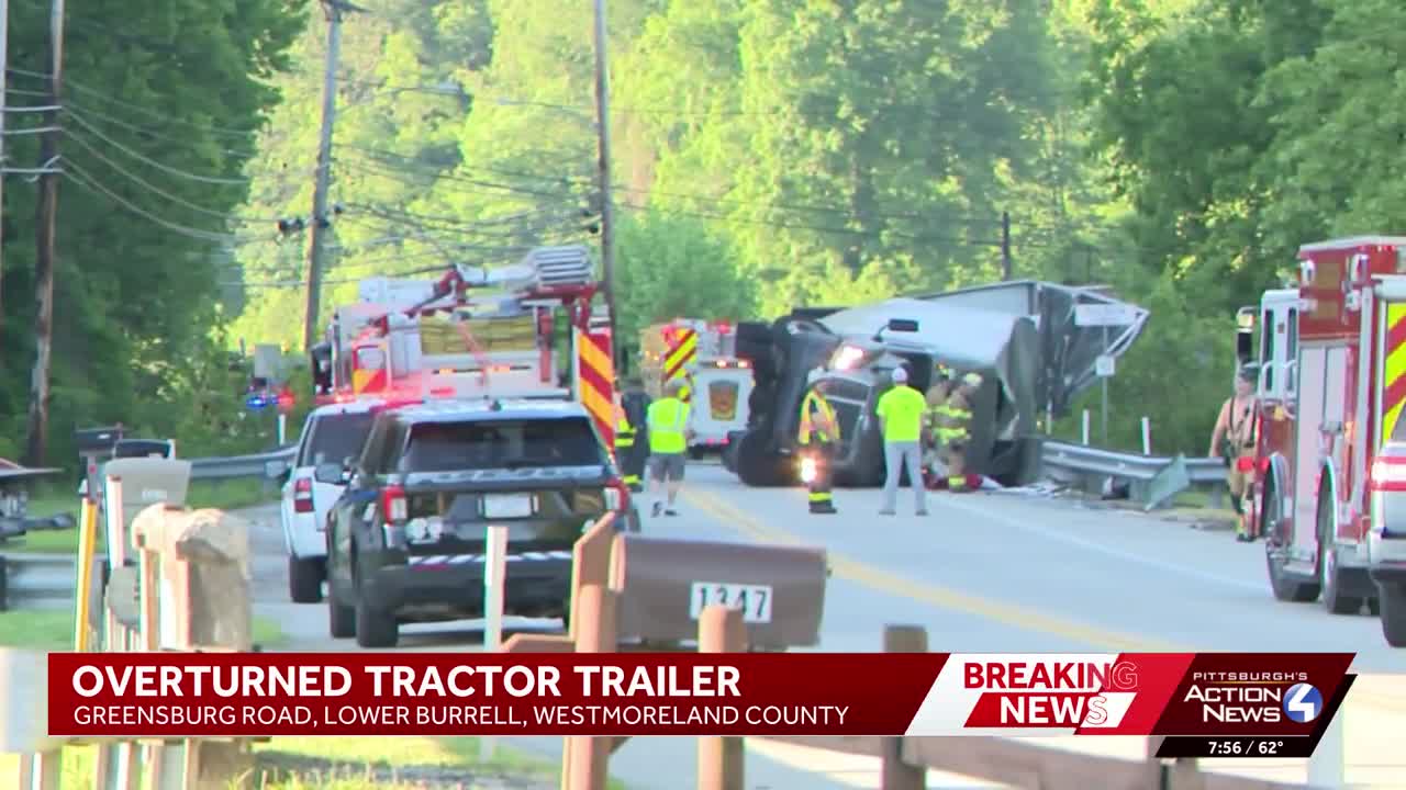 Overturned tractor trailer shuts down busy road