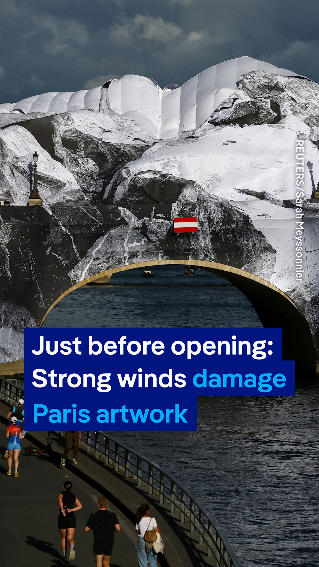 Storm hits JR’s Pont Neuf cave installation in Paris