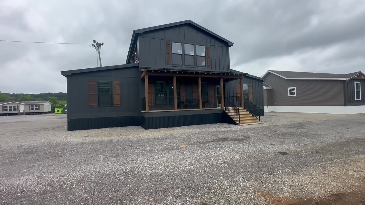 A two-story mobile home with a gas fireplace in the middle feels illegal
