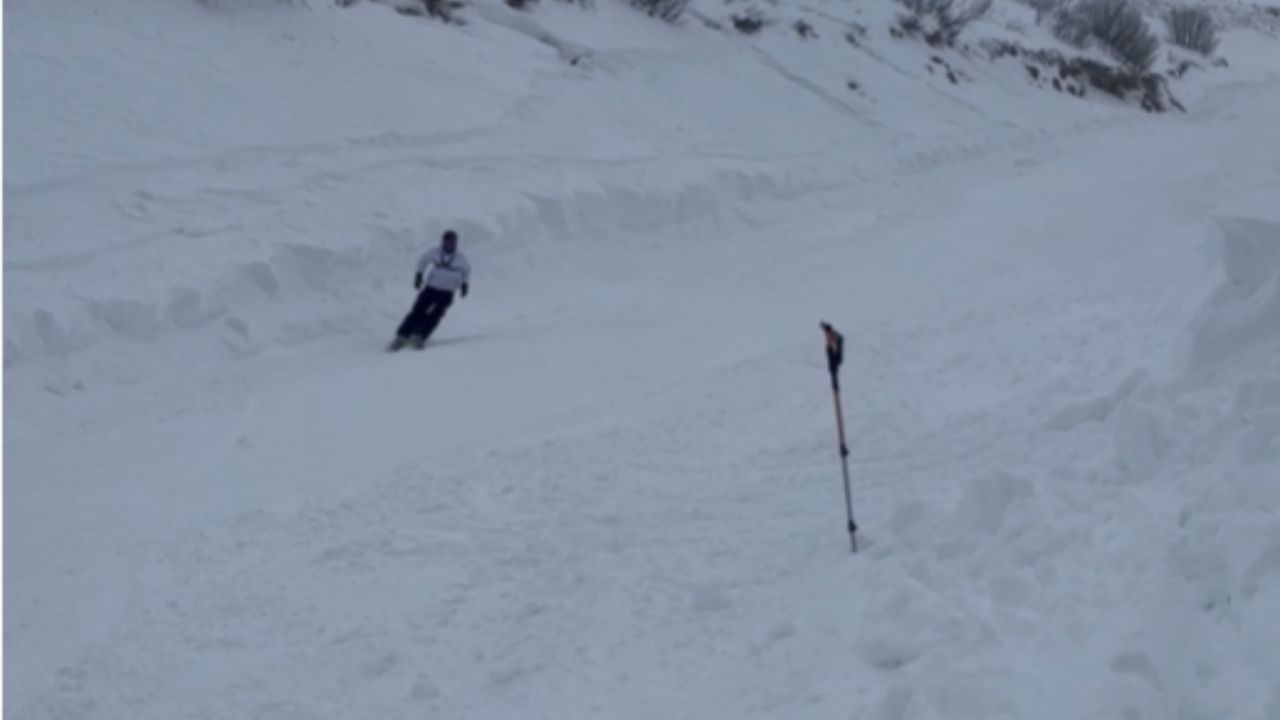 Skier launches into cork 7 trick but misses landing on mountain slope