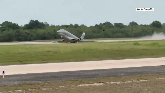 Private jet crashes on runway during emergency landing at airport