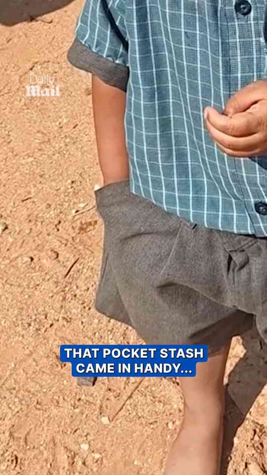 Kid sneaks in a snack during prayer time