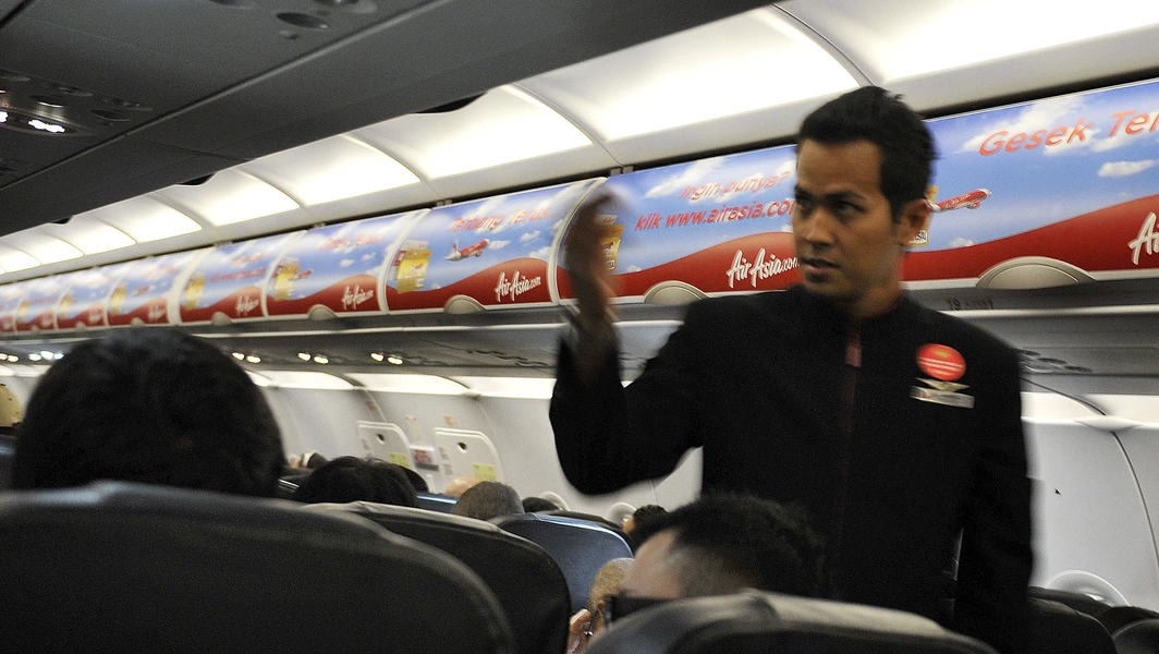 Flight attendants stress politeness in handling seat-kicking disputes