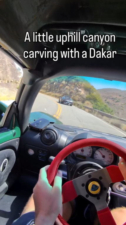Off-road canyon action taking Dakar up steep terrain