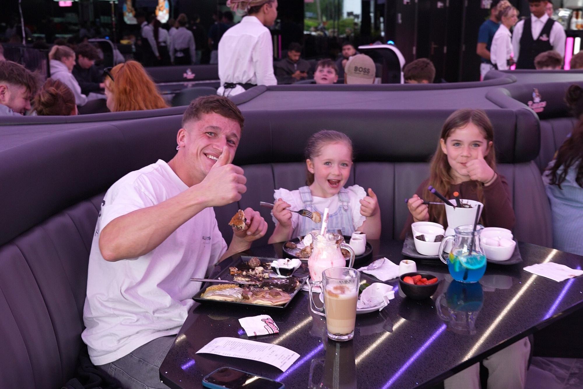Excited customers queue for opening of award-winning dessert brand ...