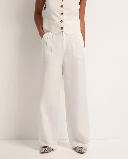 Cinco blusas de Cortefiel que disimulan los brazos, perfectas con ...