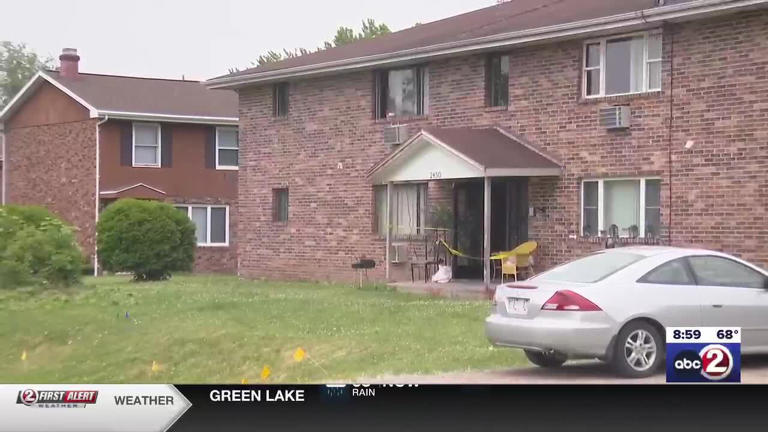 Crime scene tape blocks Fox Crossing apartment building entrance