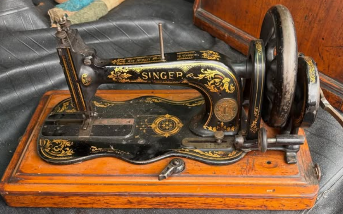 Man dismantles vintage sewing machine, discovers letter hidden inside