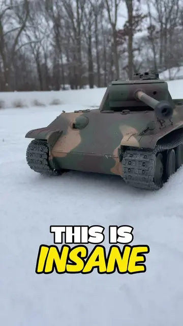 RC tank crushes snow with working turret and smoke