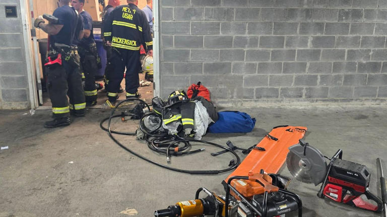 Woman rescued after falling down trash chute in New Jersey apartment ...
