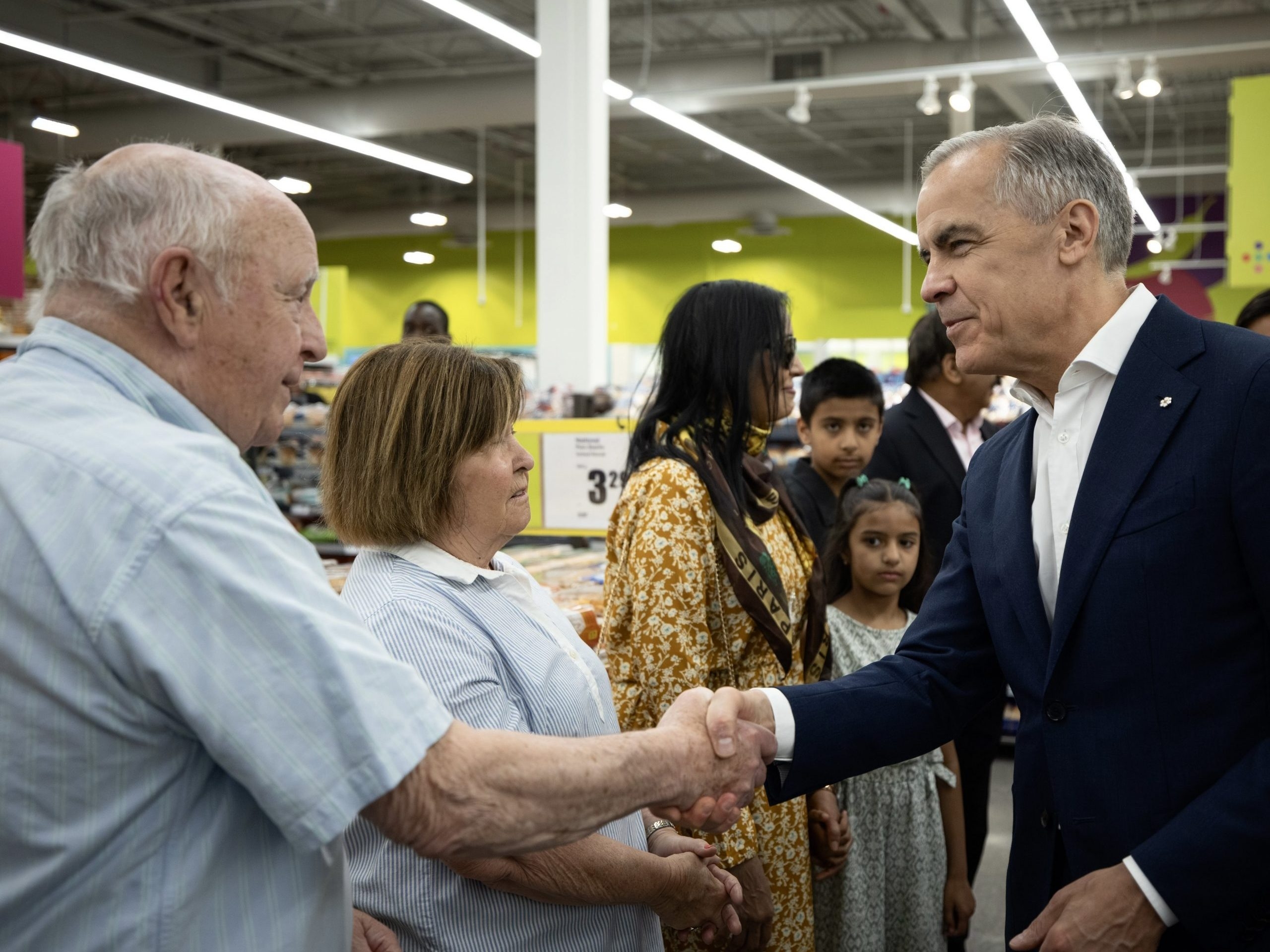 Canadians react to Mark Carney’s food and groceries 'fake' benefit video