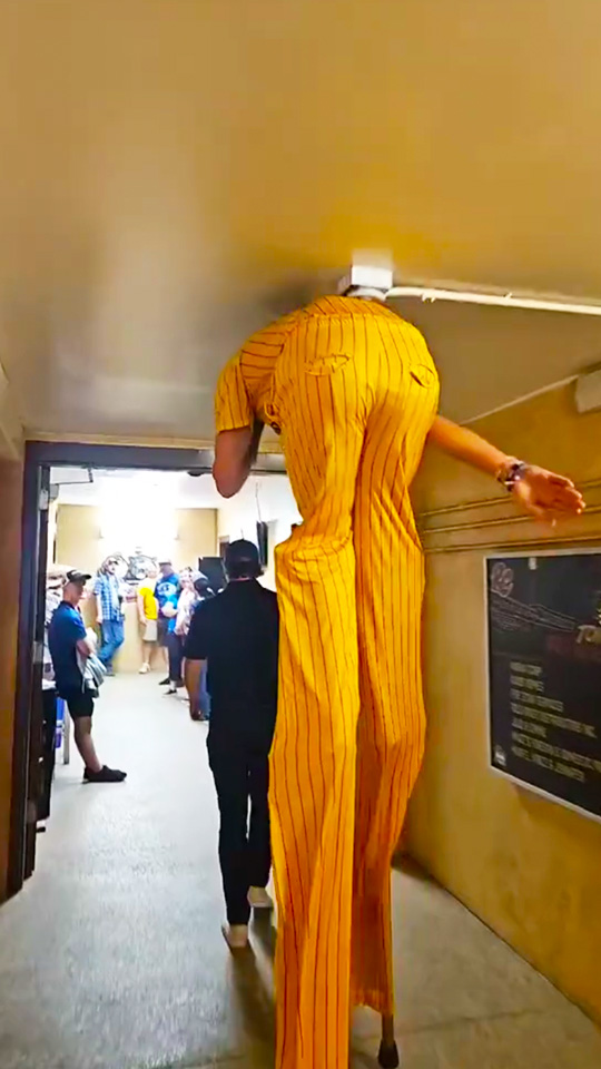 He plays baseball on stilts! 😨