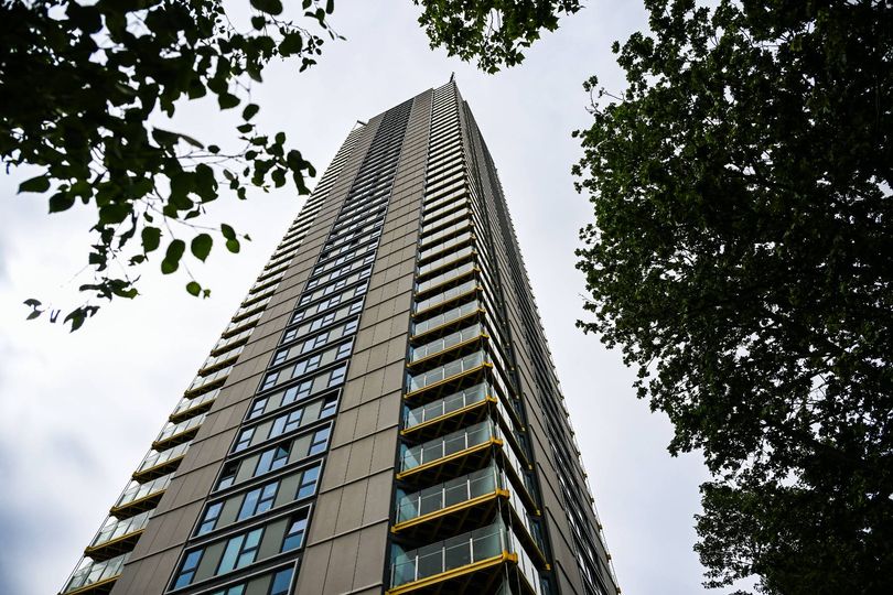 Mum, dad and son, 9, die after falling from luxury apartment block in ...