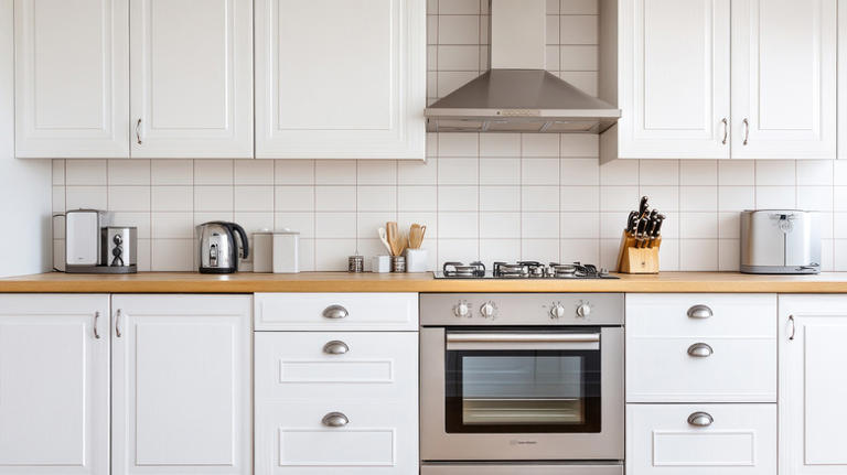'You gave me hope for my ugly white kitchen': White-to-wood cabinet DIY ...