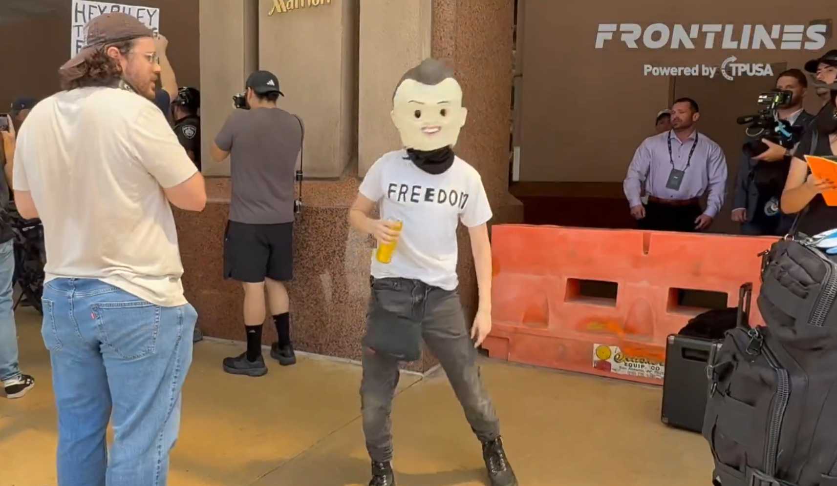 'Deserved to die!' protester mimics Charlie's death with papier-mâché ...