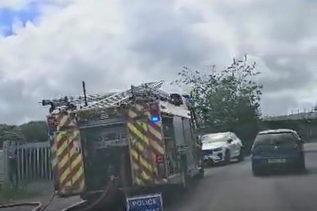Car battery fire prompts day-long emergency response on Smethurst Lane