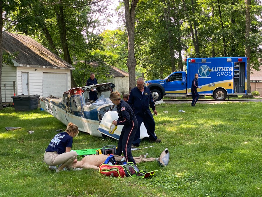Emergency crews practicing plane crash response with simulation on ...