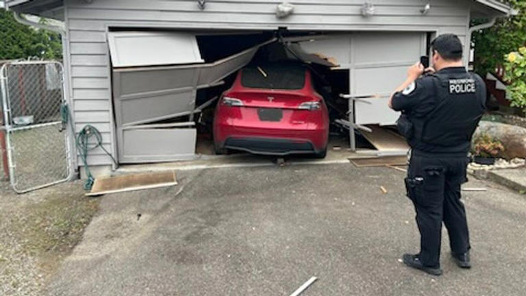 Car crashes through Redmond home's garage after autopilot malfunction