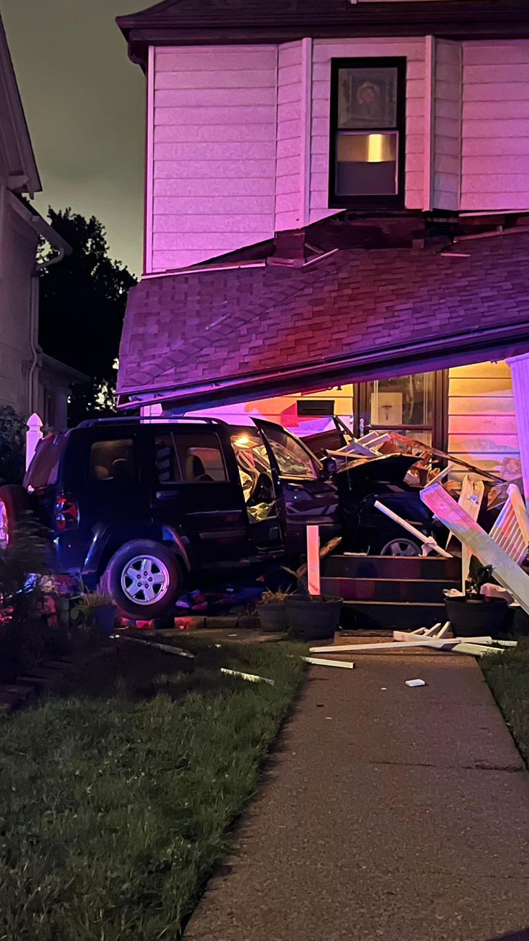 Vehicle crashes into Davenport home