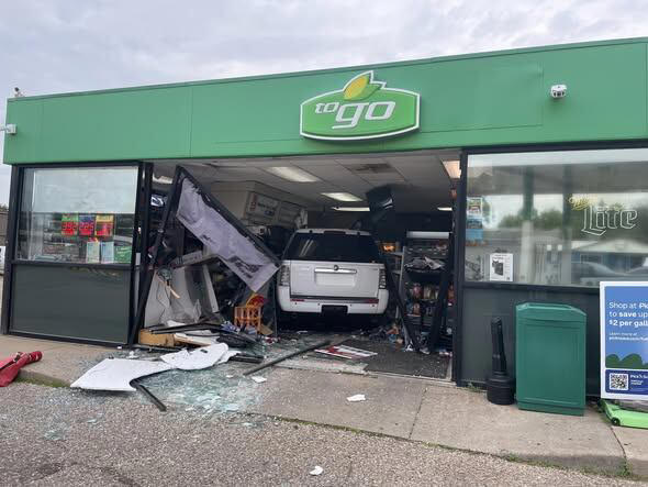 SUV crashes through Wisconsin Rapids gas station