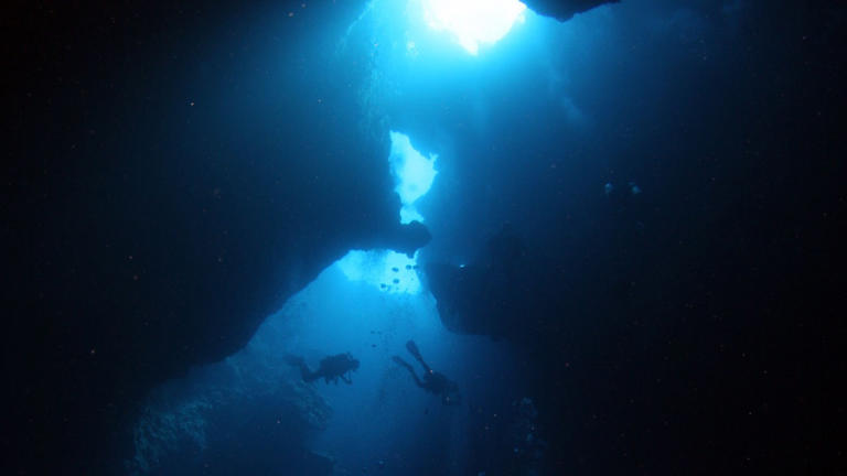The Mariana Trench is so deep that Mount Everest could sink into it and ...
