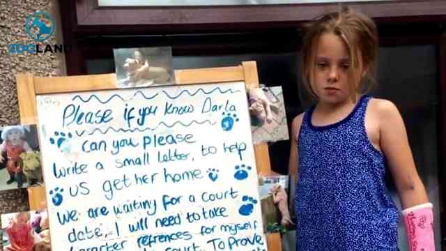 Heartfelt moment between girl and pit bull