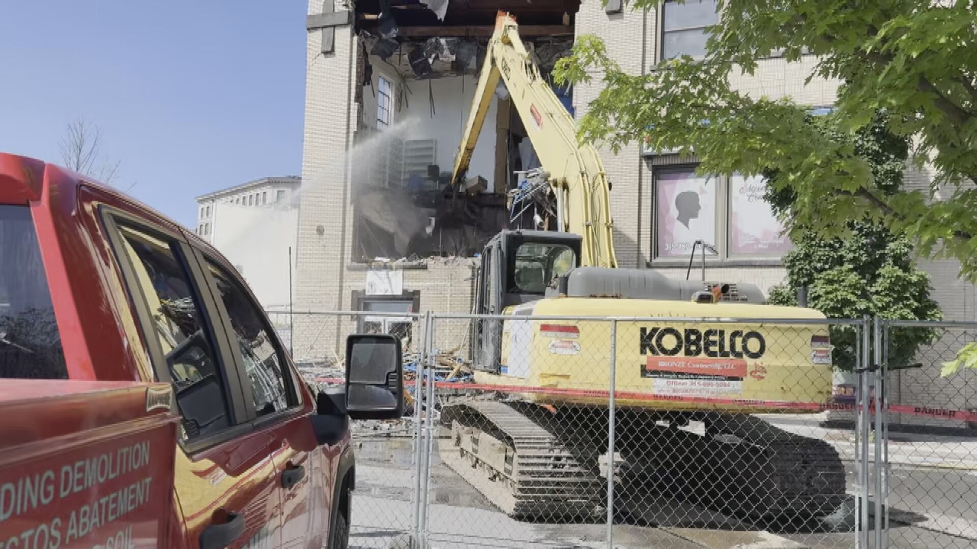 Video: Demolition begins on downtown Watertown building despite council ...