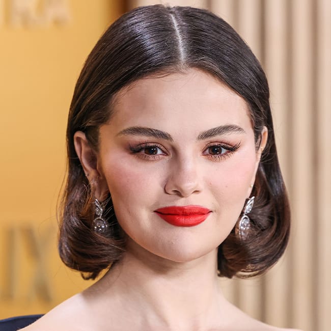 Selena Gomez looks unrecognizable with red curly hair