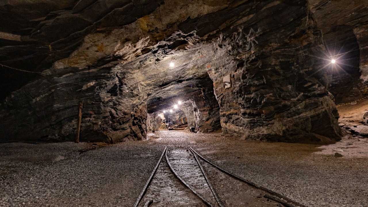 A child’s tooth and green stones in a Pyrenees cave just revealed one ...