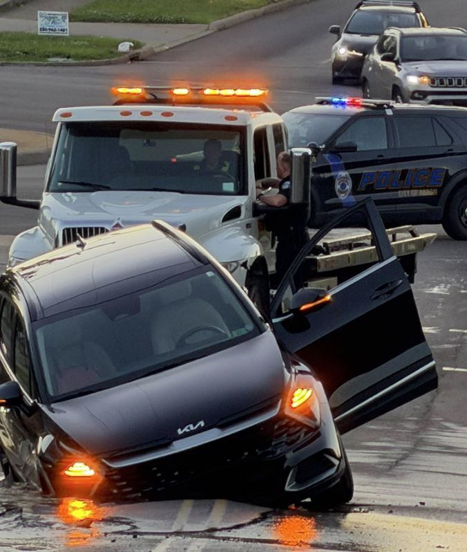 Car falls into Summit County sinkhole
