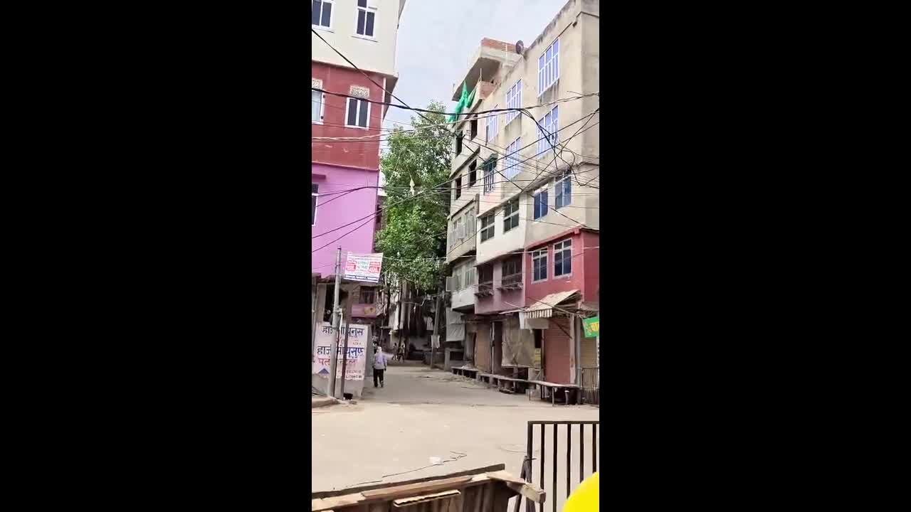 Building demolition engulfs nearby homes in cloud of dust