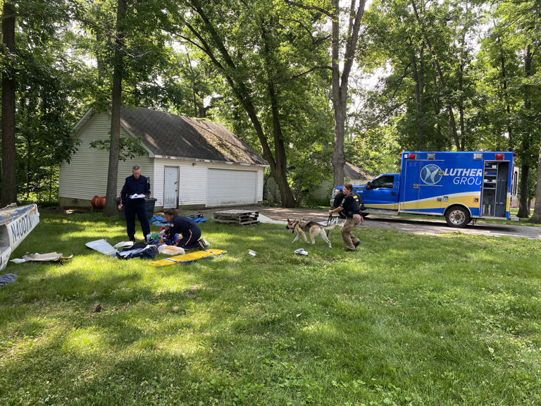 Emergency crews practicing plane crash response with simulation on ...